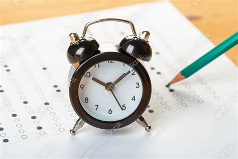 Answer Sheet Test In Exercise And Passing Examination Paper Computer Sheet With Pencil Alarm
