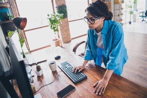 Photo Of Attractive Young Woman Standing Work Coding Typing Wear Blue Shirt Modern Office