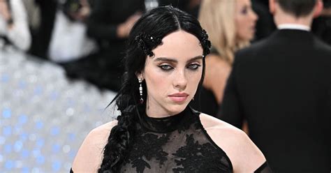 The Truth About Why Billie Eilish Never Smiles In Pictures