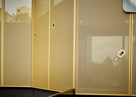 Cut Architectures Adds Golden Walls To A Community Centre