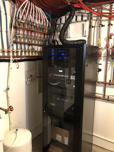 Control4 Systems Rack With Custom Cloud 9 AV Faceplate Araknis