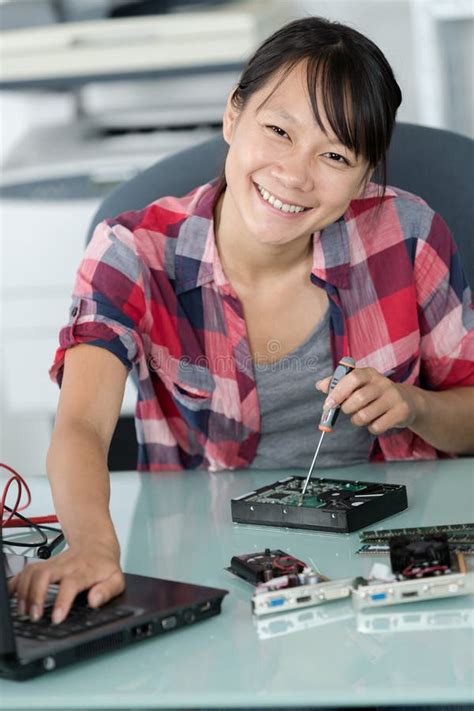 Happy Woman Fixing External Hard Drive Stock Photo Image Of Tech Woman 259238204