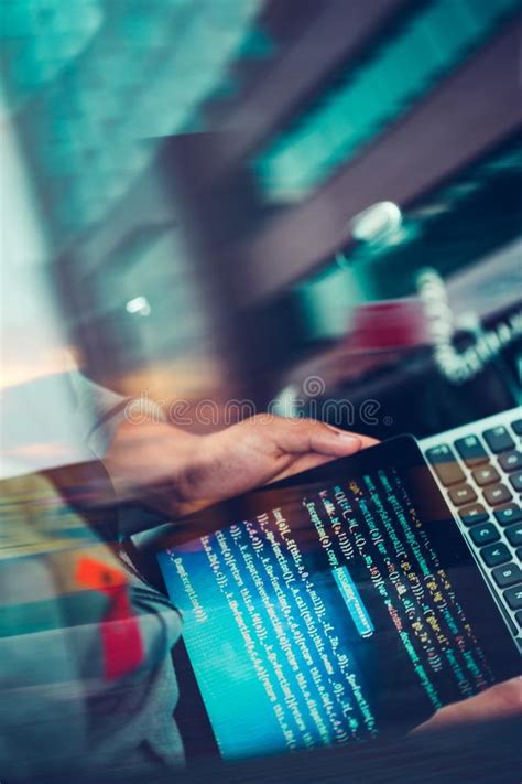 Hacker Using Computer Smartphone And Coding To Steal Password A Stock