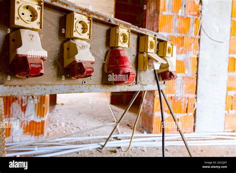 Distribution Panel With Industrial Multiphase Power Plugs And Sockets Are Providing Electrical