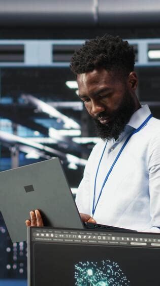 Vertical Data Center Engineer Doing Node Tree Programming To Optimize