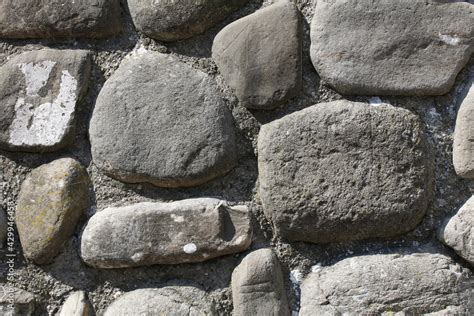 Foto De Stock Muro Di Sassi Scuri E Lisci Adobe Stock