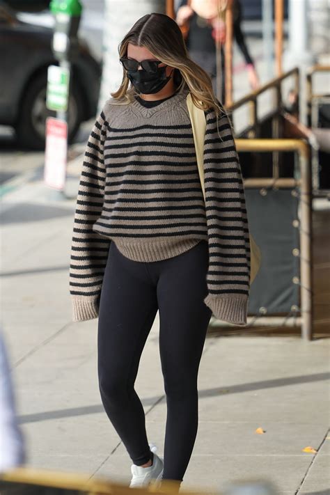 Sofia Richie In An Oversized Sweater And Black Leggings At Beverly