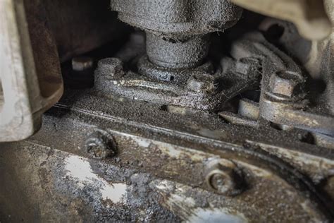 Premium Photo Leaking Right Drive Shaft Seal In A Car