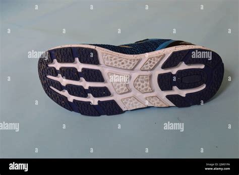 Under The Soles Of Running Shoes After Use Stock Photo Alamy