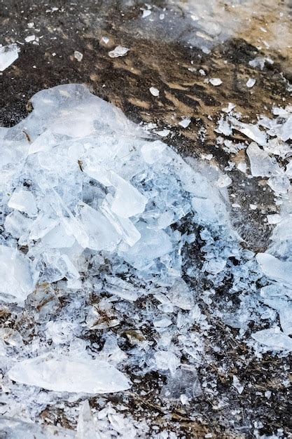 Premium Photo Shards Of Ice On A Frozen Ground