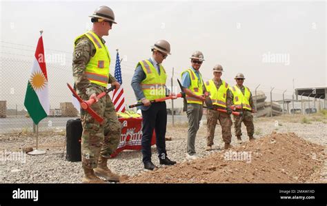 Colonel Brian Ducote Near The Commander For Task Force Warrior And Representatives For The