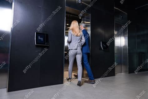 Two People Entering The Elevator In The Business Center 이미지 2202846957
