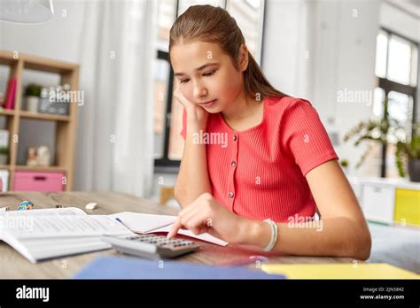 Babe Girl Counting On Calculator At Home Stock Photo Alamy