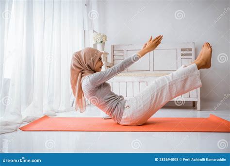 Muslim Hijab Woman Warming Up Before Exercise Doing Yoga Pilates Pose