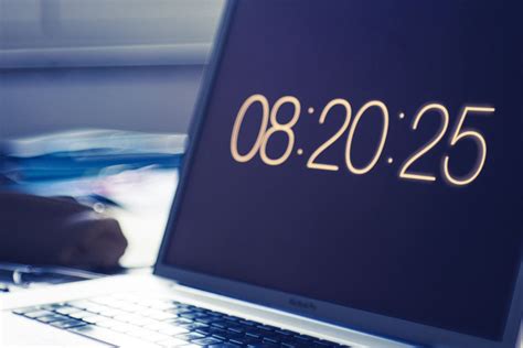 Laptop Clock On Screen Royalty Free Photo