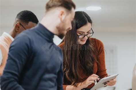 Diverse Team Collaborating For Business Growth Analyzing Reports