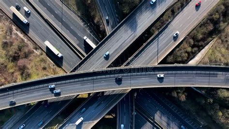 Vehicles At Rush Hour Driving Through A Freeway Intersection Aerial View Stock Video Video Of