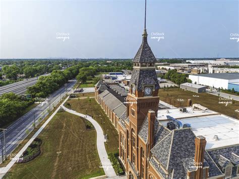 Aerial Fusion Of Past And Present Pullman Clock Tower And Wind Turbine Chicago