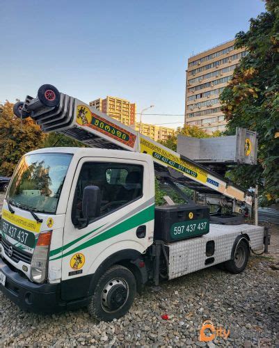 მასალების სართულებზე აზიდვა ამწე ჟირაფის დახმარებით Citymarket Ge