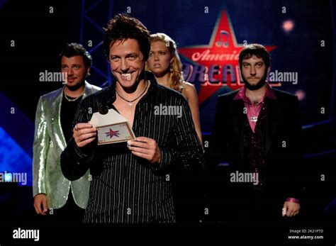 SAM GOLZARI HUGH GRANT MANDY MOORE ADAM BUSCH AMERICAN DREAMZ 2006