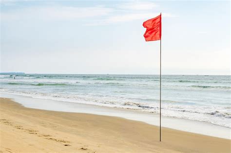 Premium Photo Red Flag On Beach On Sea Or Ocean As A Symbol Of Danger The Sea State Is
