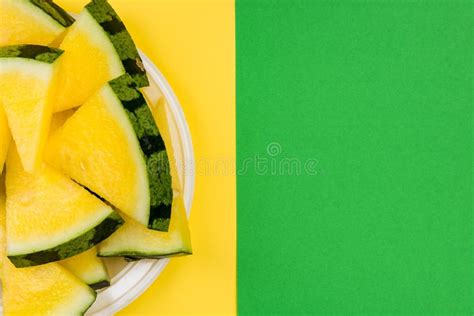 Yellow Seedless Watermelon Sliced On Plate Pastel Backgroundcopy