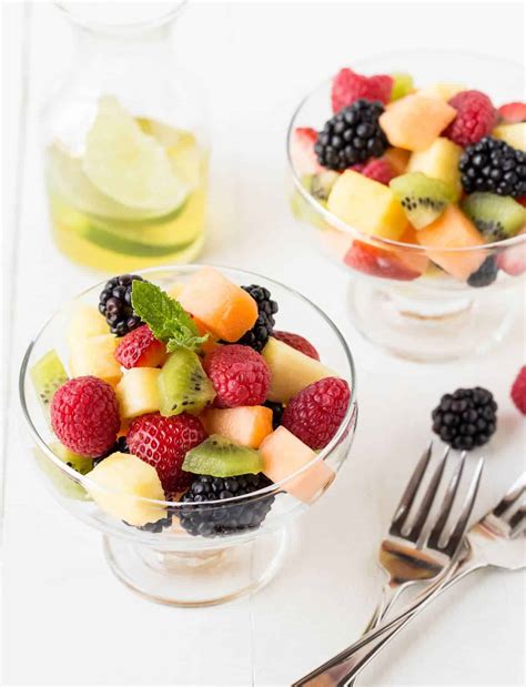 Fruit Salad With Lime Mint Dressing Garnish With Lemon