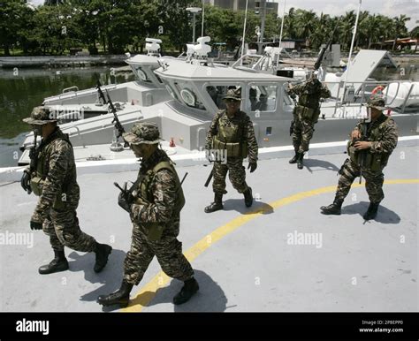 Philippine Navy Seals Walk Past Three Newly Acquired Multi Purpose