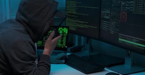Computer Hacker Typing Code On Keyboard Late Night Working And Bypassing Cyber Security By