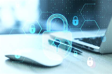 Premium Photo Close Up Of Laptop Computer Mouse And Pen At Desk With Glowing Hexagonal Padlock