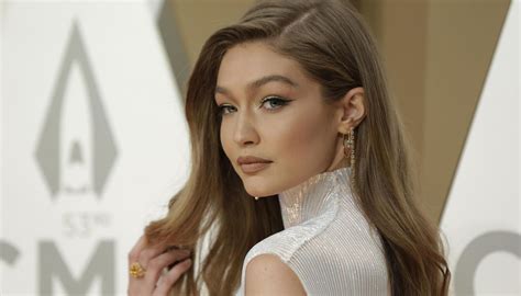Gigi Hadid Gets Curtain Bangs Ahead Of Holiday Season