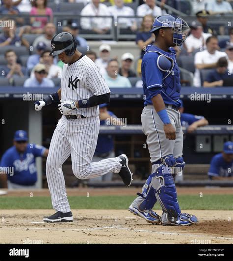 New York Yankees Derek Jeter Crosses Home Plate Past Kansas City Royals Catcher Salvador Perez