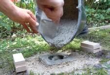 Installing And Leveling Your Deck Using Pre Fab Footings And Fixing The Joists