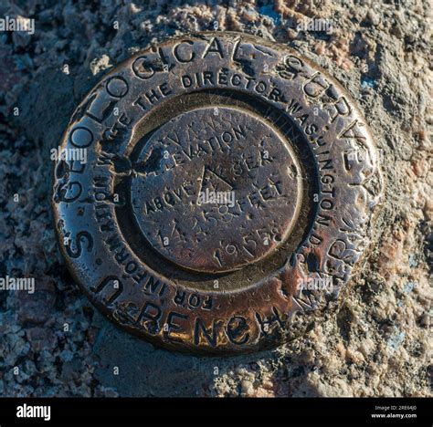 The Geological Survey Marker At The Peak Of Mount Evans In Colorado