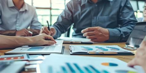 Colleagues Engaging In Data Analysis Discussion At A Meeting Concept Data Analysis Team