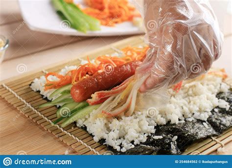Close Up Korean Female Making Gimbap Korean Roll Rice With Sausace