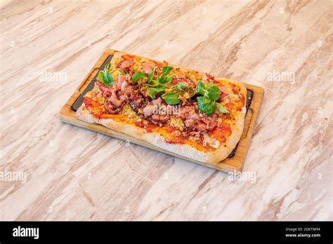Rectangular Pizza With Carbonara Recipe With Lambs Lettuce And Lots Of