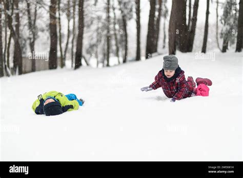 Borhter And Sister Having Fun Together In Beautiful Winter Park Stock