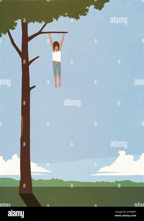 Woman Hanging From Tree Branch Stock Photo Alamy