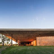 Monumental Grassy Roof Covers Planar House In Brazil By Studio MK27