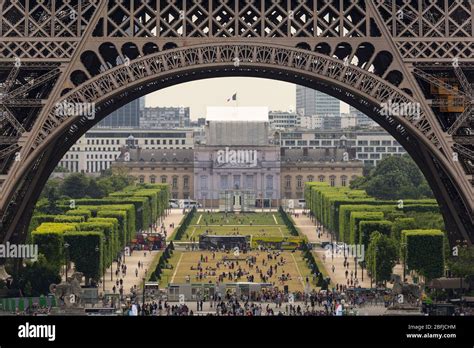 View Of Parc De La Tour Eiffel Through The Foundation Arch Of The Eiffel Tower Paris Stock