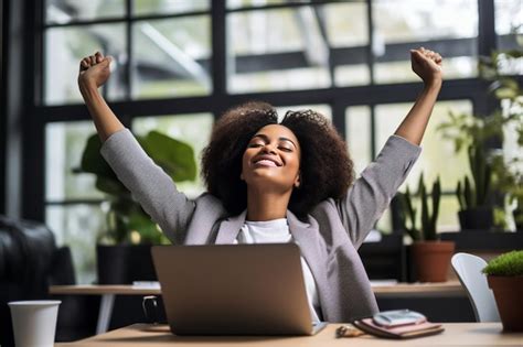 Premium Photo Empowered African American Businesswoman Embracing Success In The Modern Office