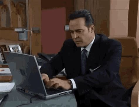 Person Working On A Computer S Tenor