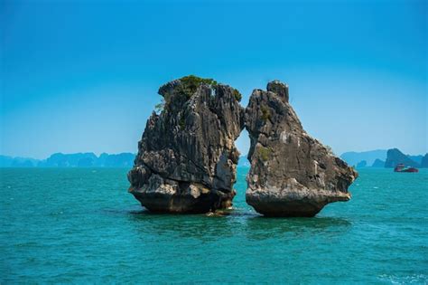 Premium Photo Hon Ga Choi Island Or Cock And Hen Fighting Cocks Island Located In Halong Bay