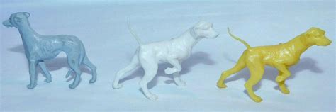 2 Toy Miniature Pointer Dogs Made By Andy Gard 1960s Yellow And White