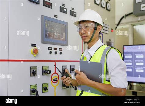 Engineer Working On The Checking Status Switchgear Electrical Energy