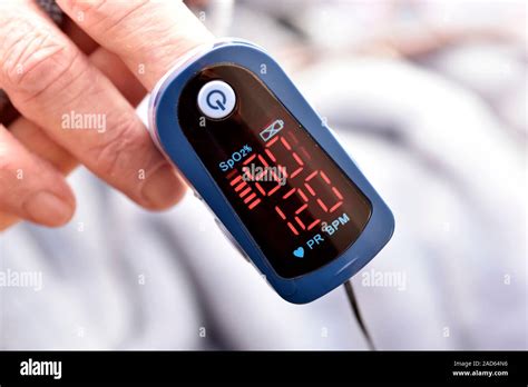 Pulse Oximeter Close Up Of A Pulse Oximeter On The Finger Of An 81 Year Old Woman With Copd