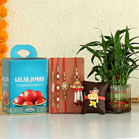 Buysend Set Of 5 Rakhis With Gulab Jamun And Bamboo Plant Online Fnp