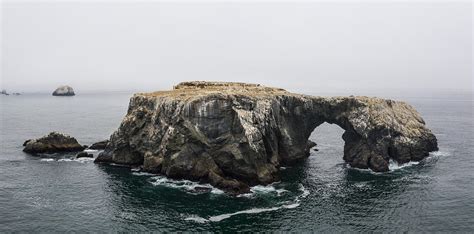 A Massive Sea Stack Formed Photograph By Ethan Daniels Fine Art America