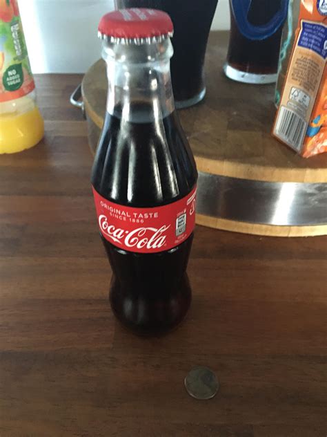 This Smaller Than Normal Coke Bottle Penny For Scale R Mildlyinteresting